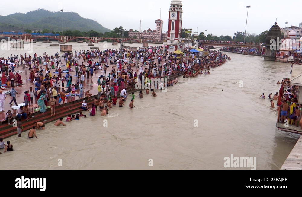 Pilgrims taking a holy bath in Ganges river on the occasion of a Hindu ...