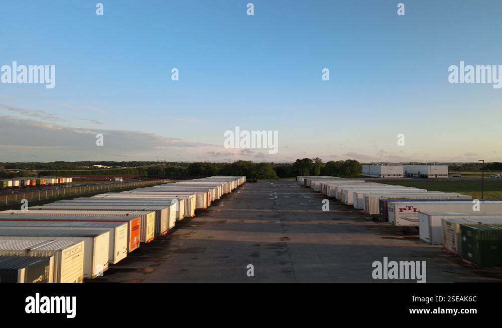 Flying through a storage yard of moving trailers Stock Video Footage ...