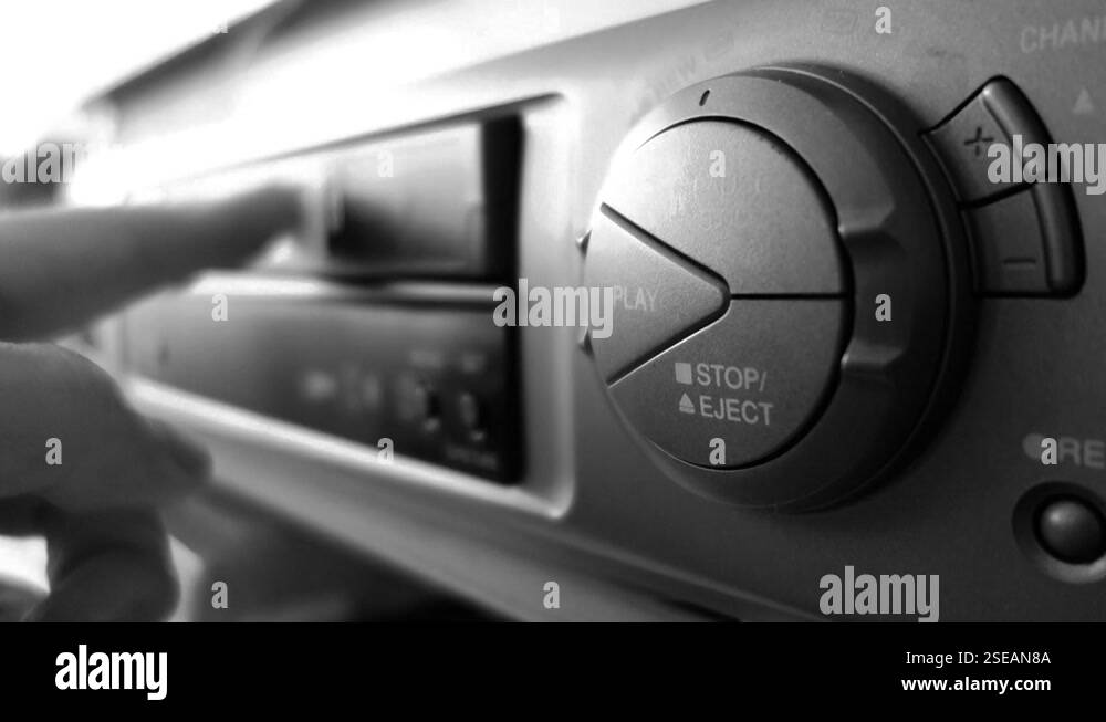 Video cassette recorder, inserting and starting tape. VCR buttons ...