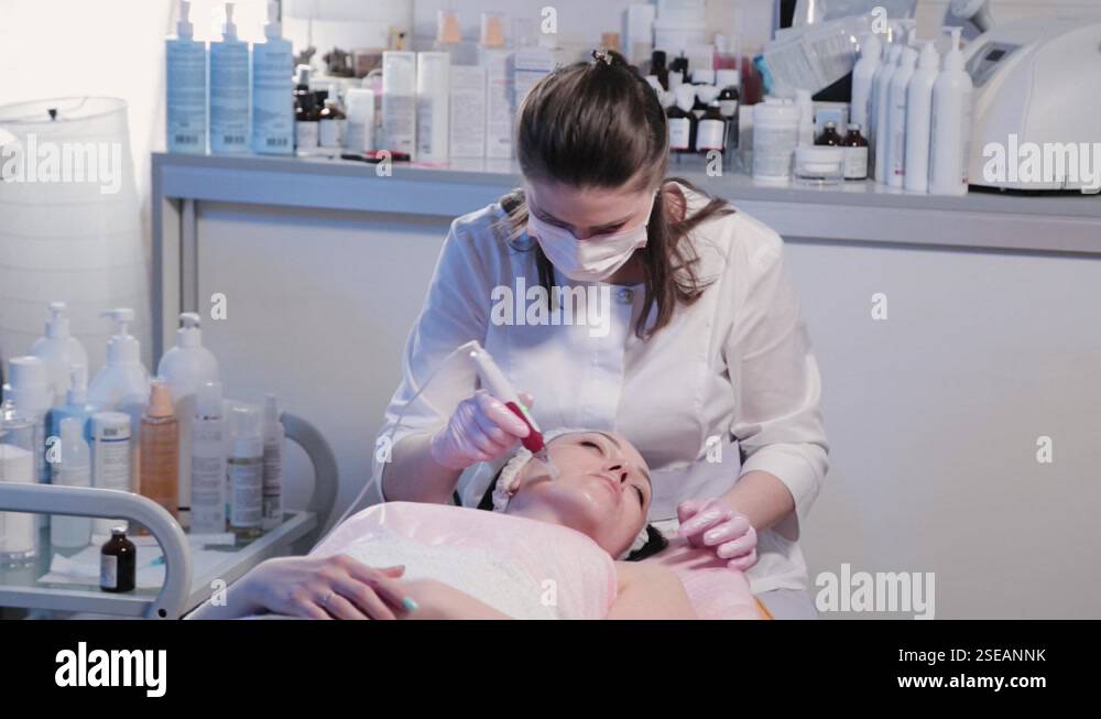Woman beautician doing mechanical peeling of the face Stock Video ...