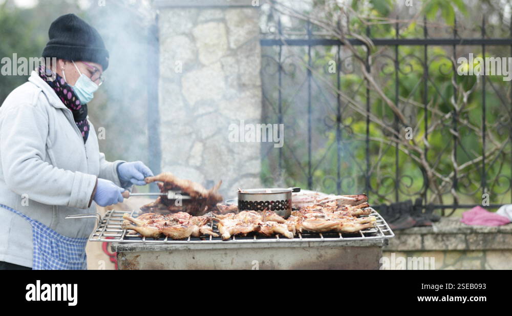 Female Wearing Surgical Mask Grilling Chicken Outdoor Selling It On ...