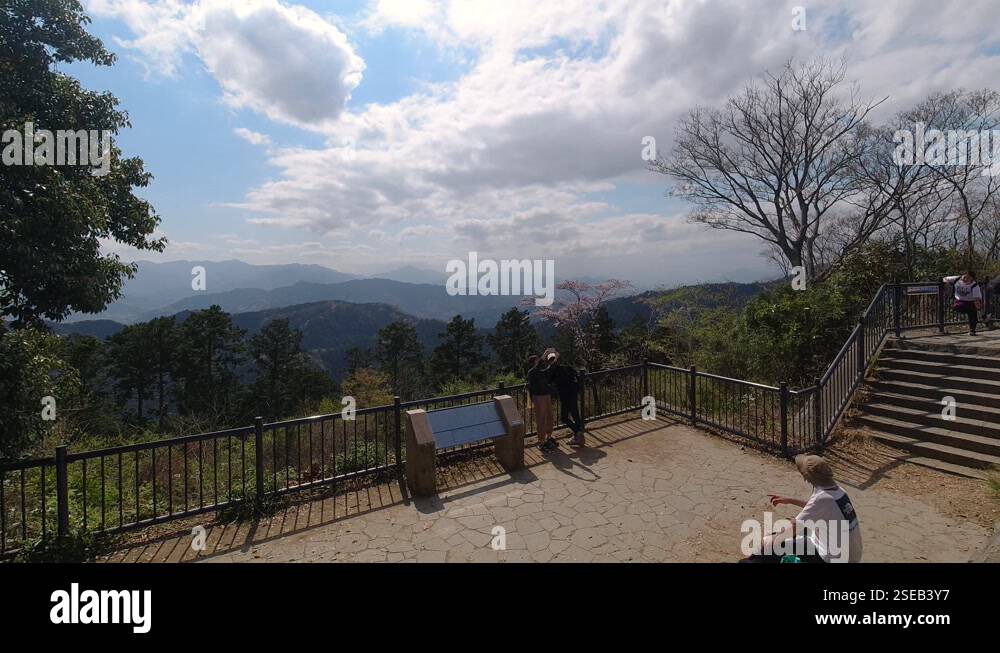 Many hikers enjoying view from top of Mount Takao in Tokyo, Japan ...