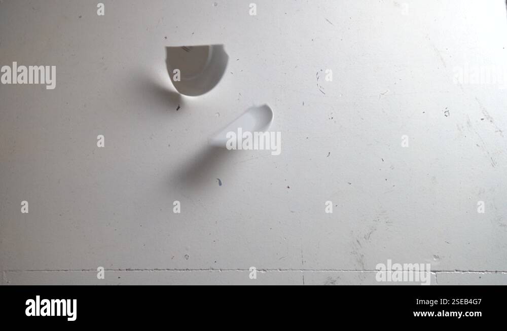 Smashing Plate Into Pieces On A Dirty Floor, Slow motion top down shot ...