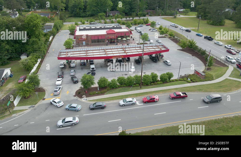 Long lines of cars line up due to a gas shortage Stock Video Footage ...