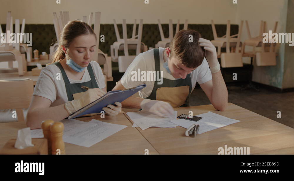 Two waiters, owners of a restaurant, are depressed and frustrated ...