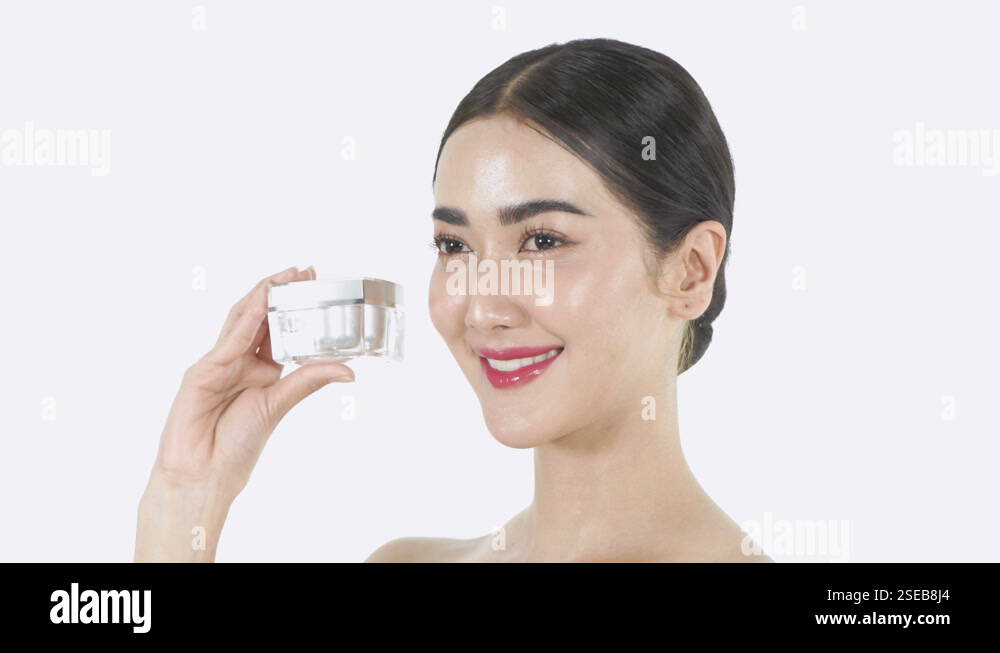 Beauty concept of 4k Resolution. Young woman presenting cream bottles ...