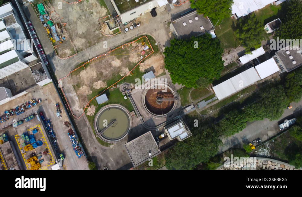 Ariel Bird View Drone dolly push in over factory Cheung Chau Island ...