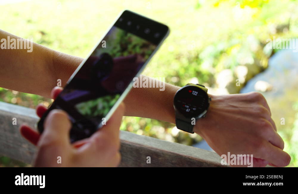 Person take photo of smartwatch jogging stats for social media 4K Stock ...