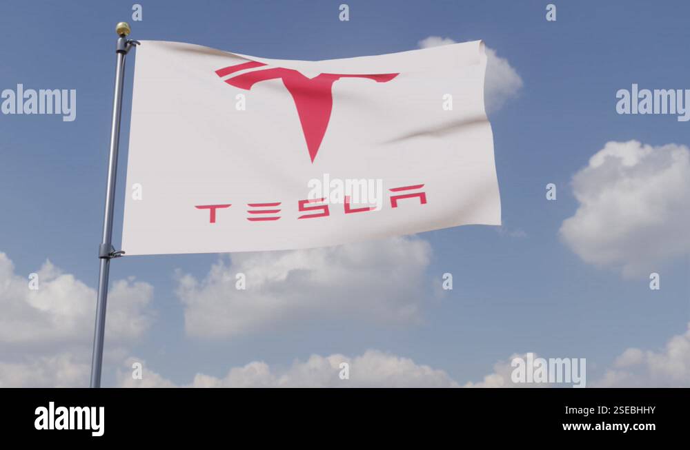 Flag with Tesla logo flapping in the wind a cloudy day in Austin, Texas ...