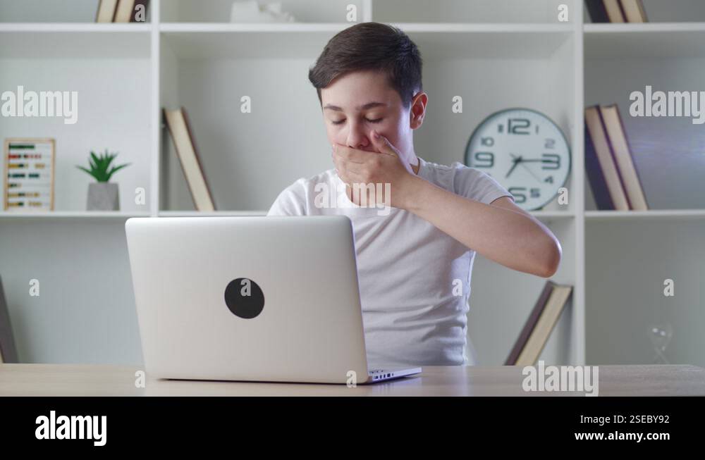 Scared boy shocked by terrible scene while reading horror news on ...