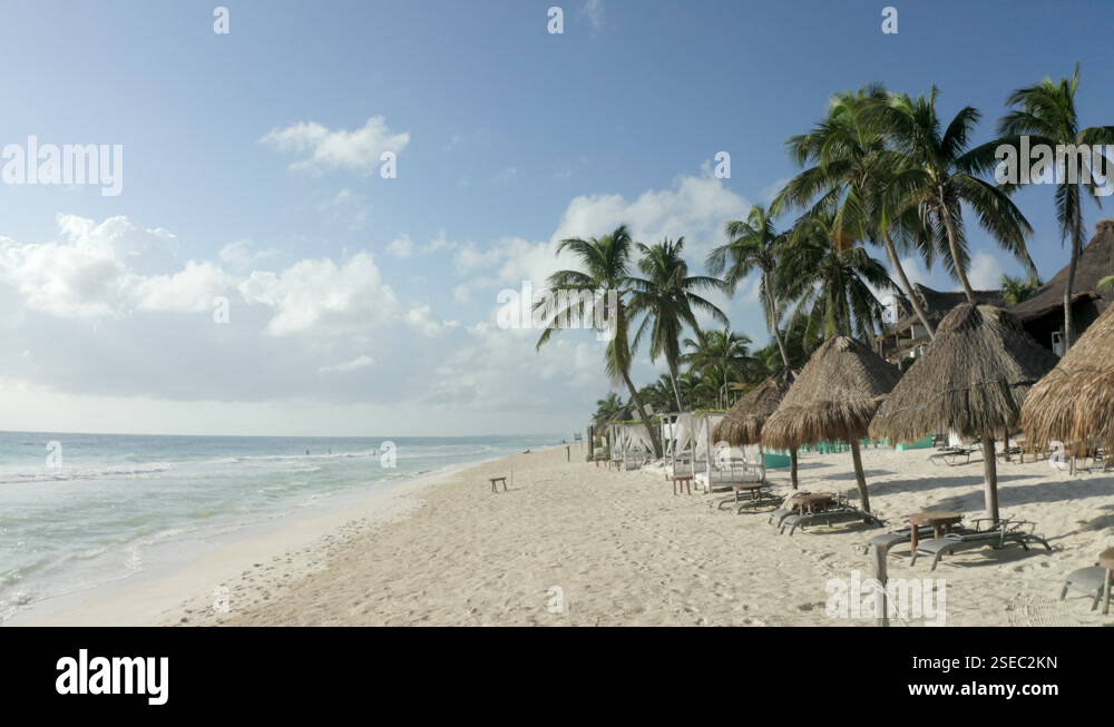 Low Aerial Moving Forward Along A Beautiful Yucatan Beach Resort Lined ...