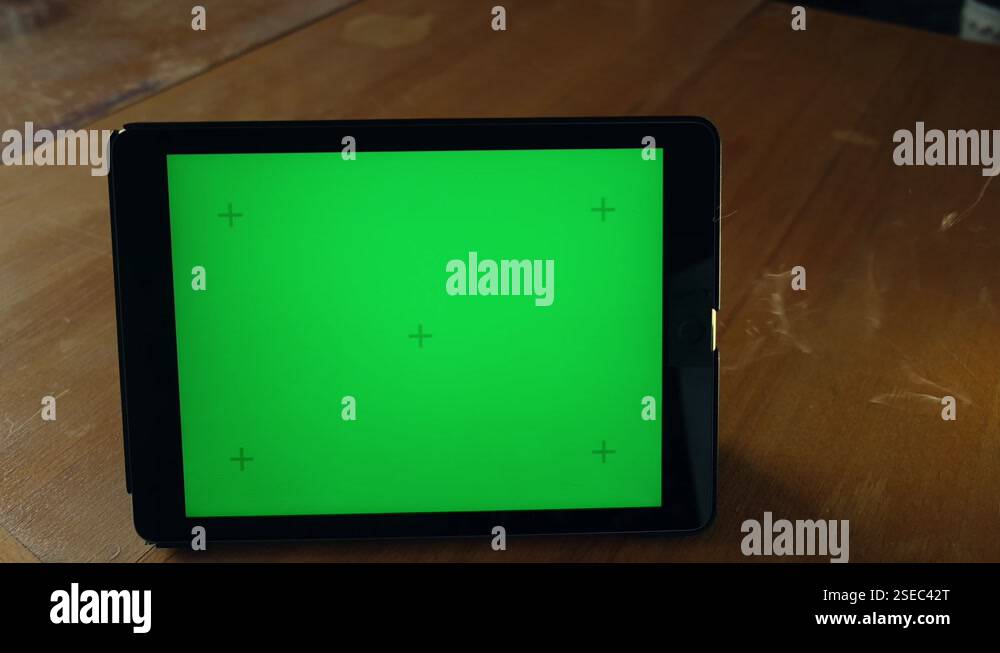 Tablet with the green screen smoke Stock Video Footage - Alamy