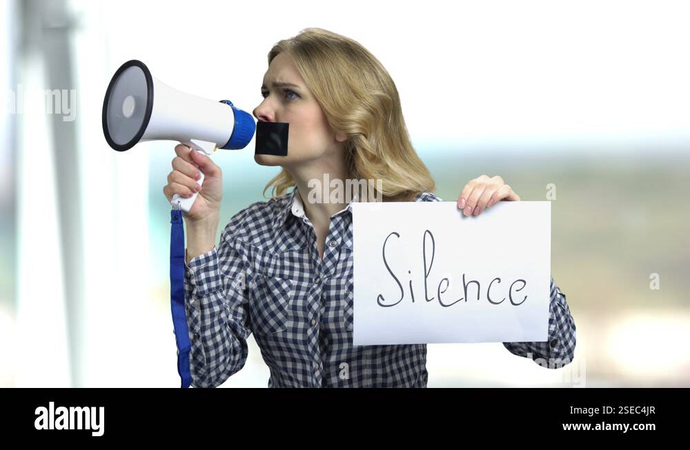 Silenced woman with megaphone can not speak Stock Video Footage - Alamy