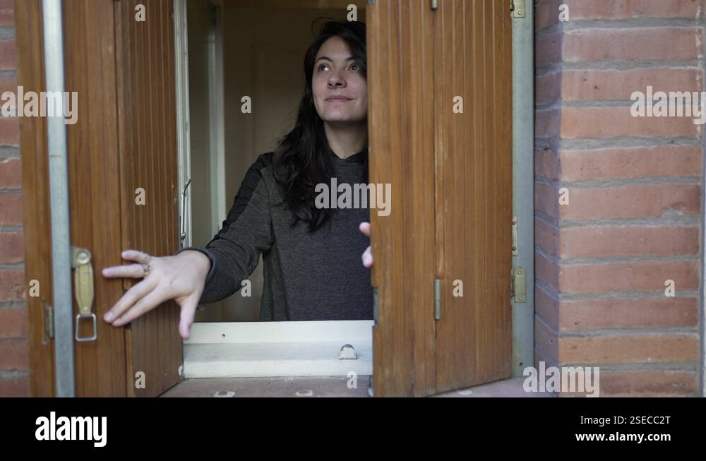 Woman opening house windows and staring outside, person looking out ...