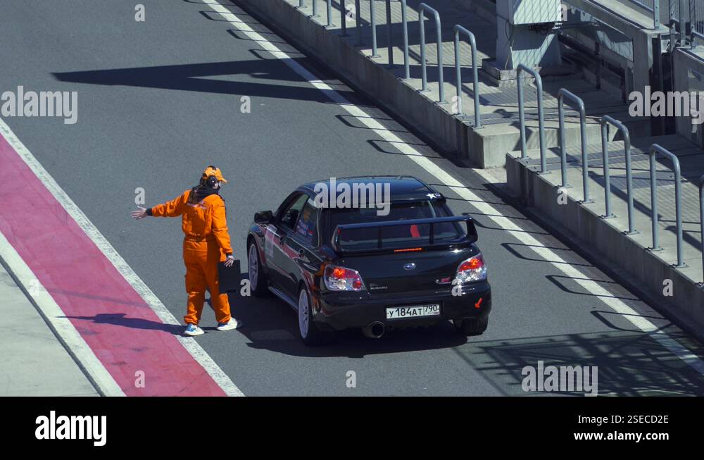 Russia, Moscow May 26, 2021 Moscow Race Way The black car pulls into ...