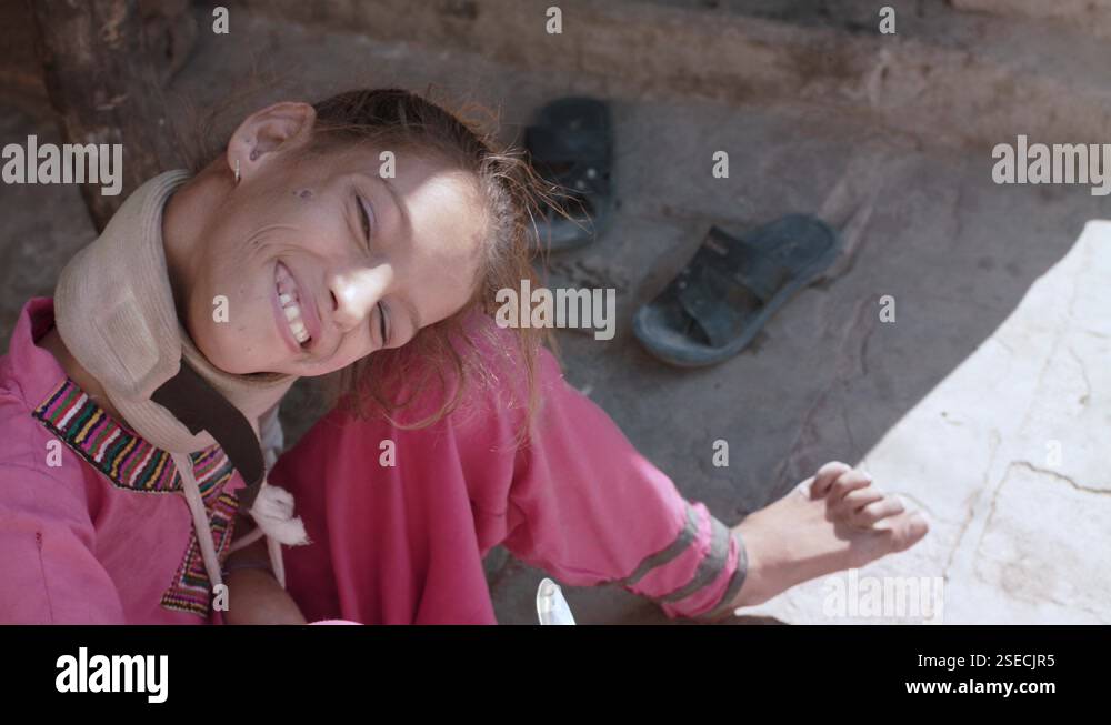 Beautiful low-angle shot shows brave differently-abled teen girl ...