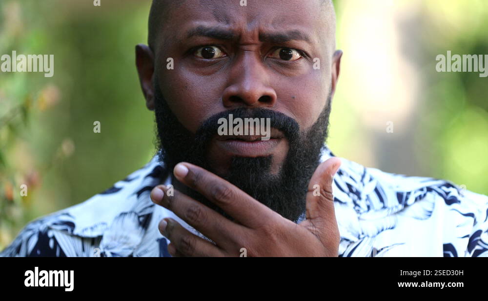 Black man SHOCK terror emotion. unbelief African person in DESPAIR ...