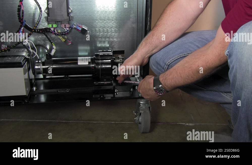 Tightening bolt on paint mixer machine with a wrench zoom in Stock ...