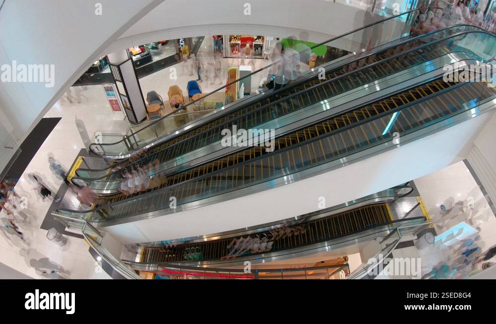 Time lapse of crowd of people in shopping mall. Escalators in modern shopping ma Stock Video ...
