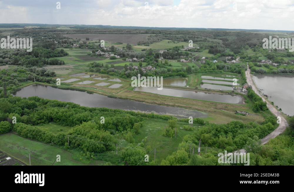 Fisheries on lake. Lakes with fish farm. Traditional fish farming ...