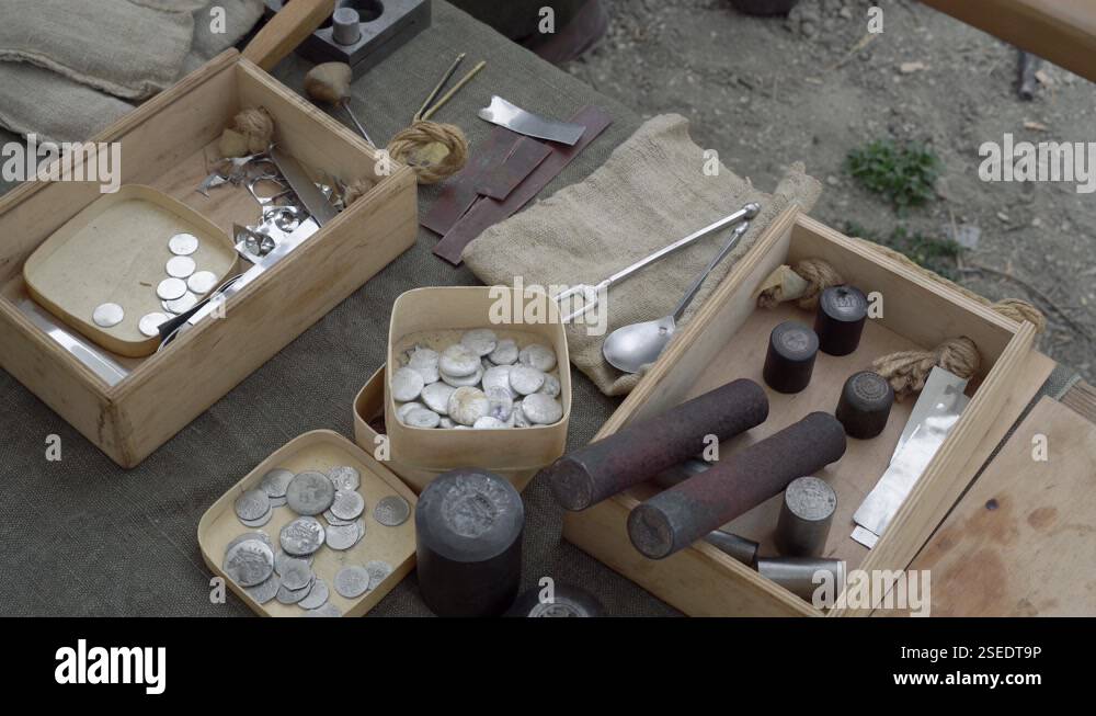 Moneyer Mints Money. Ancient Coin Dies. In minting, coining or coinage ...