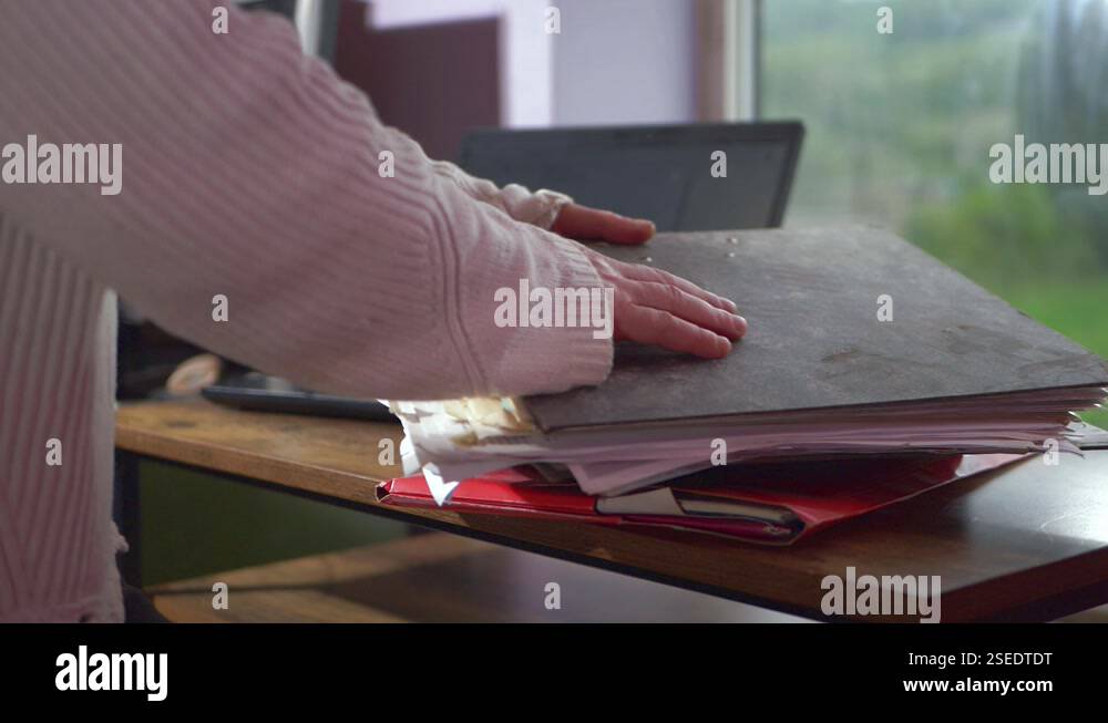 Busy woman in office with files and papers Stock Video Footage - Alamy