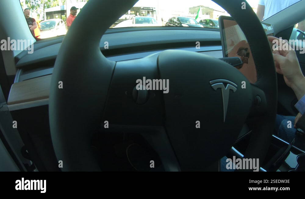 A TESLA electric car. The touch panel inside the Tesla car Stock Video ...