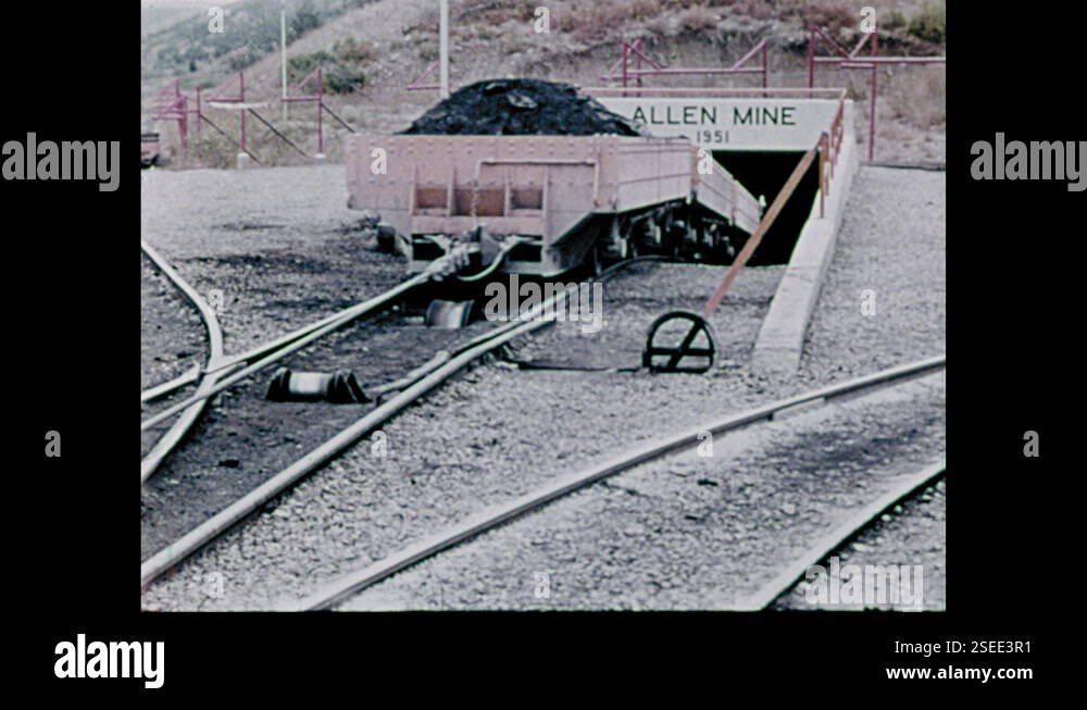 1970s: Coal seams and rocks. Coal train emerges from Allen mine tunnel ...