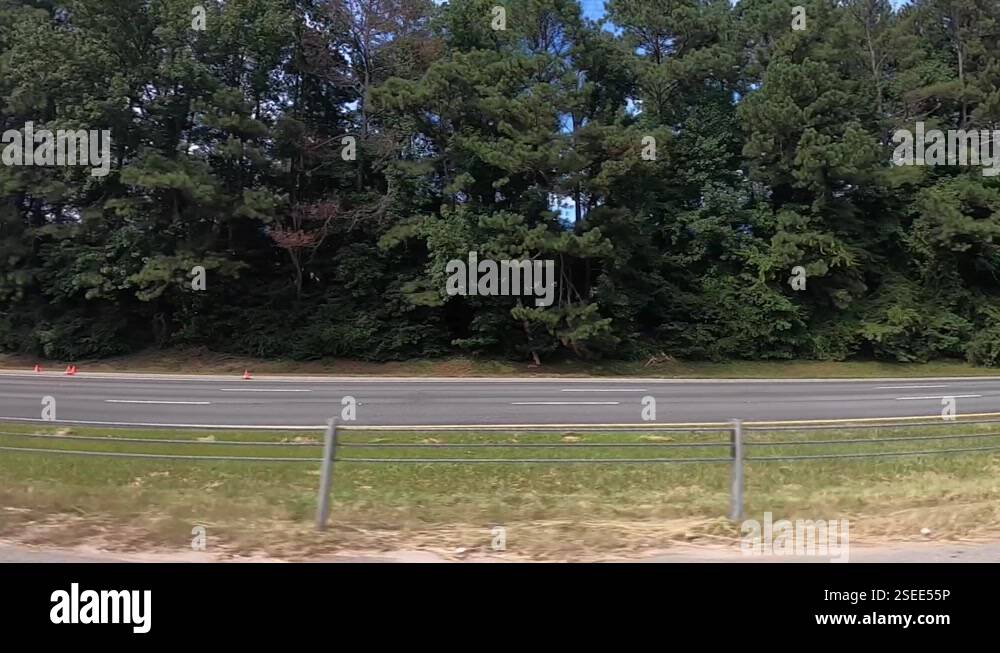 POV side view traffic on interstate Highway 78 - wire guide barrier and ...