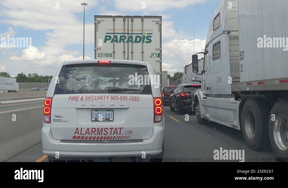 Epic POV driving plate slow moving rush hour traffic gridlock on ...
