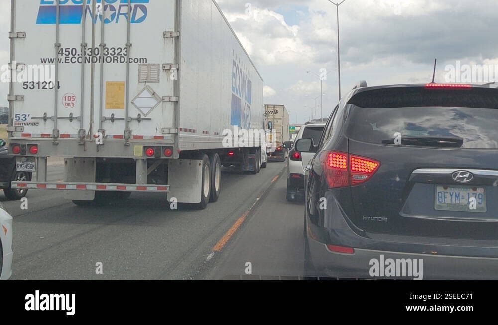 Epic POV driving plate slow moving rush hour traffic gridlock on ...