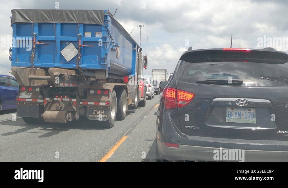 Driving plate stuck in slow moving rush hour traffic gridlock on ...