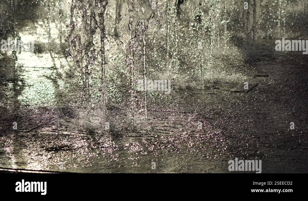 Dry city fountain with water jets changing height, without a bowl ...