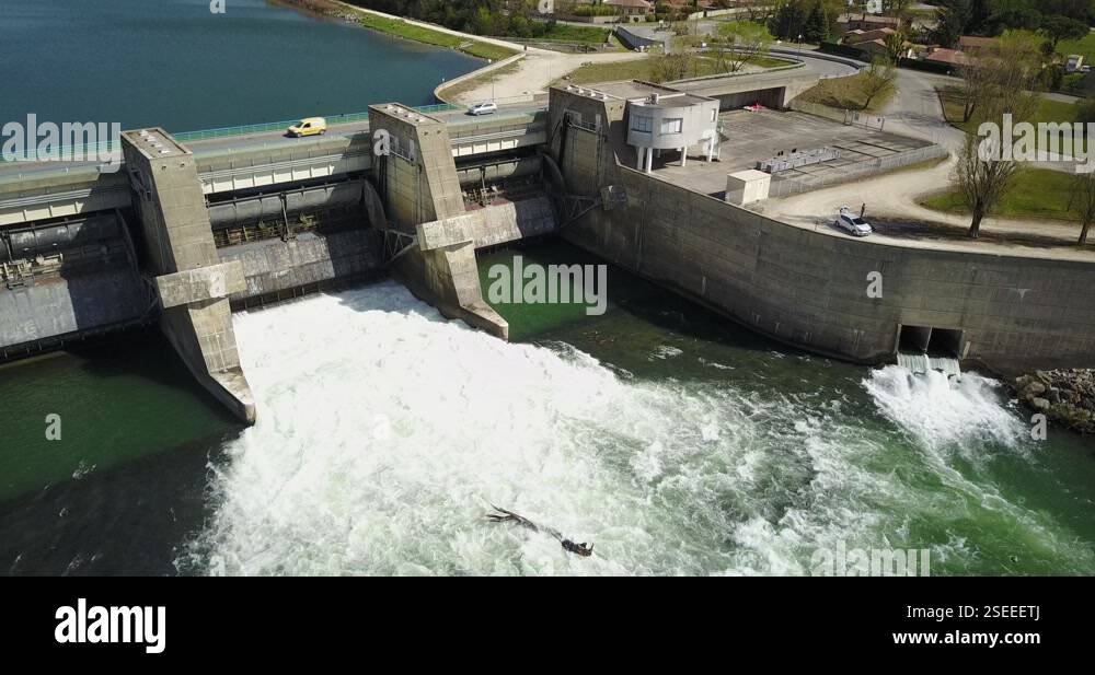 Aerial Static, Heavy water flow from an Electrical Dam over the Rhone ...