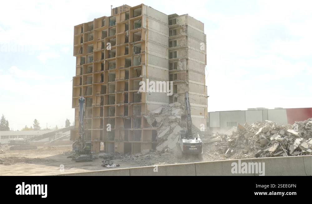 Heavy plant machinery is used in Toronto Canada to demolish old ...