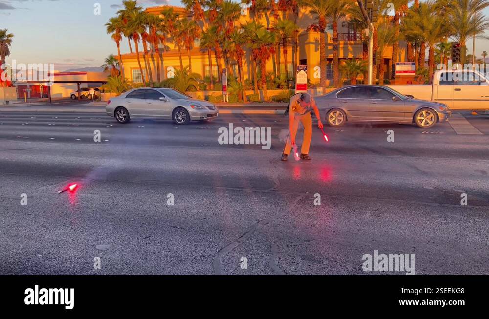 Police officers lay out road flares near crash scene Stock Video ...