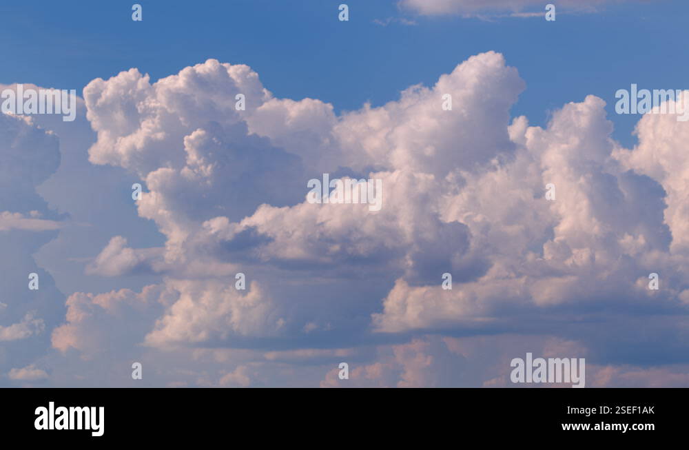 Fluffy blue sky view white clouds moving storm Stock Video Footage - Alamy