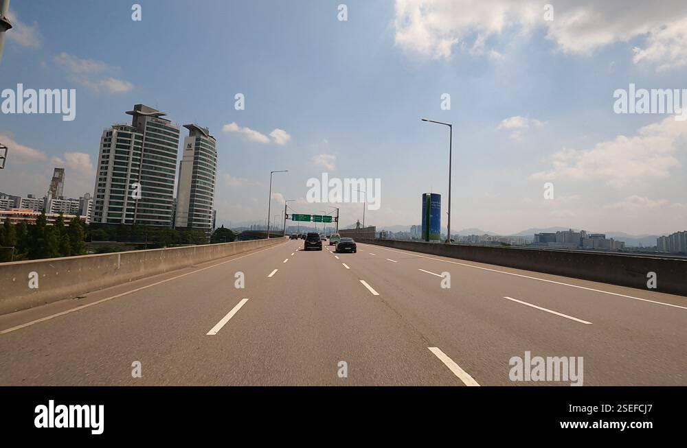 Driving in Seoul Expressway Gangbyeonbuk road on sunny day in summer ...