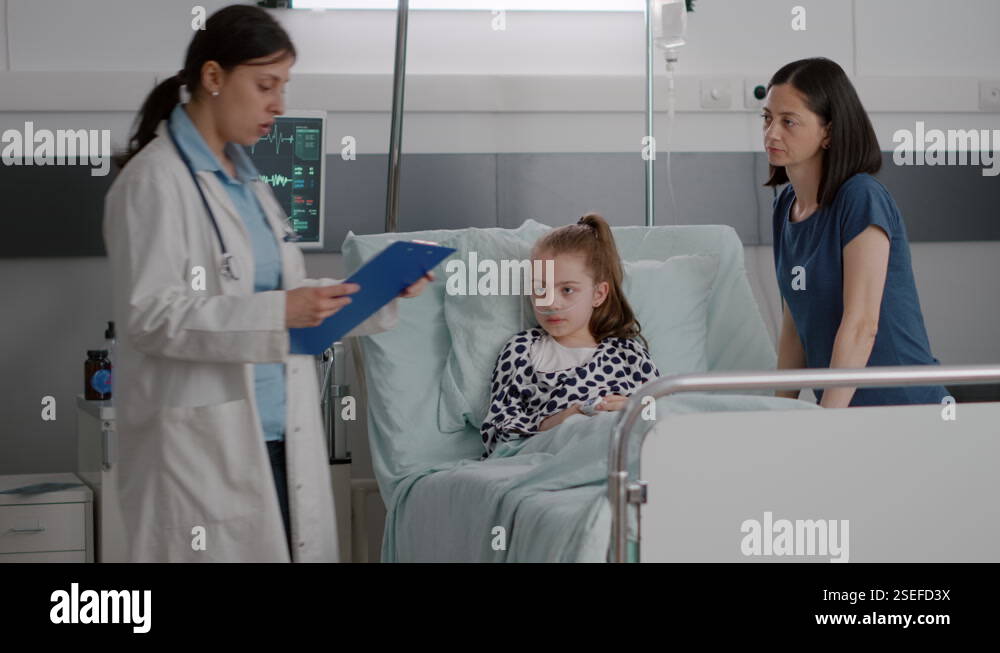 Sick patient wearing oxygen nasal tube resting in bed recovering after ...