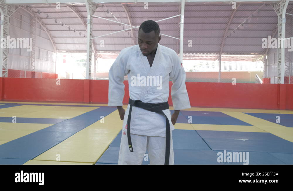 Judo Athlete Preparing for Training. Real training of athletes in the ...