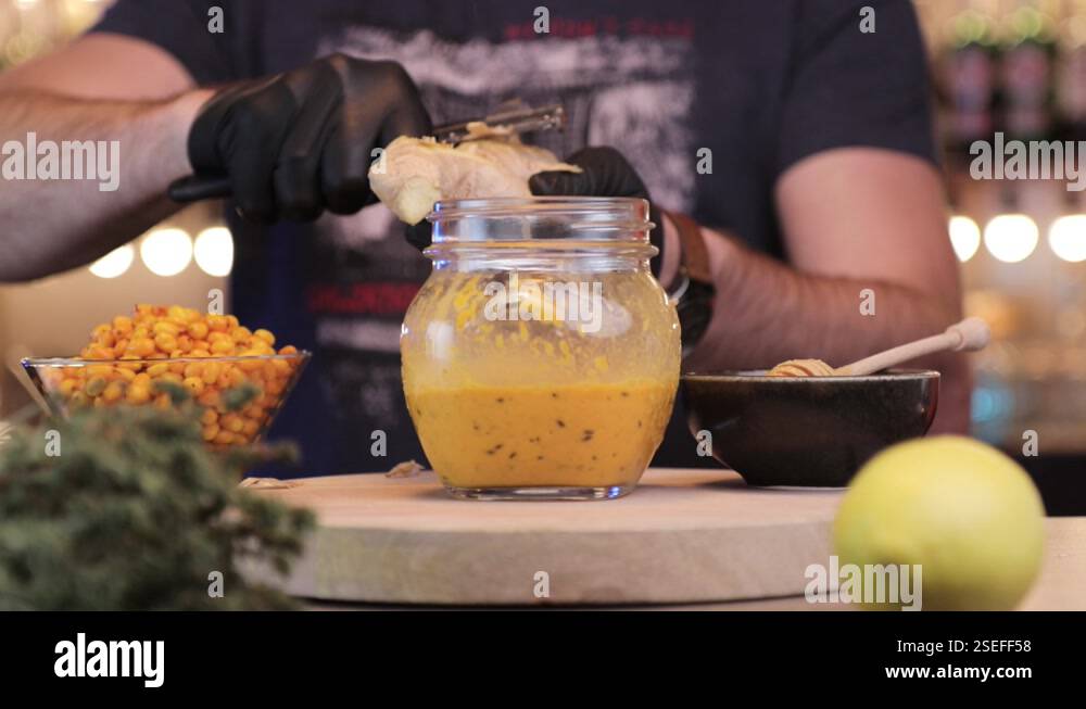 a man clean ginger peel Stock Video Footage - Alamy