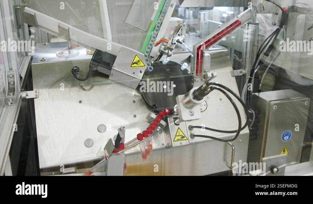 Automated manufacturing of Covid-19 test tubes in a clean room Stock ...