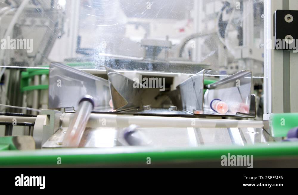 Automated manufacturing of Covid-19 test tubes in a clean room Stock ...