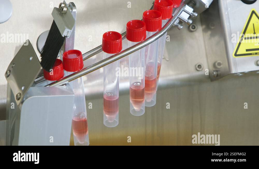 Automated manufacturing of Covid-19 test tubes in a clean room Stock ...