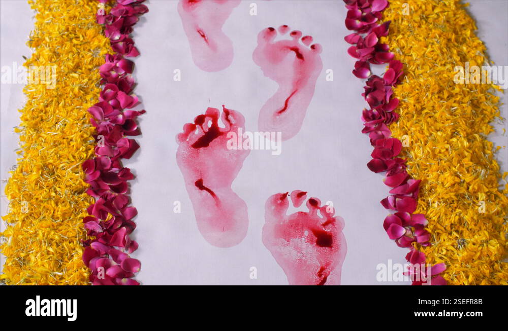 A newly married woman's red footsteps symbolic to the arrival of ...