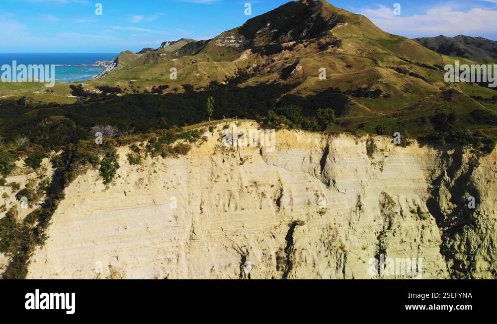 Steep Limestone Cliffs By The Seashore At Tolaga Bay Wharf In New ...