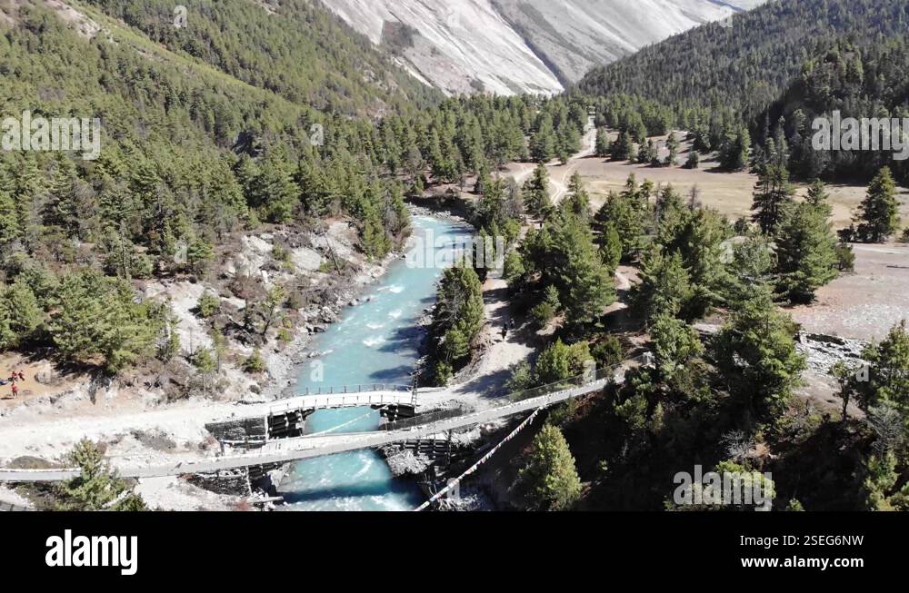 Hanging Bridge Over The Marsyangdi River On Annapurna Trek In Nepal ...