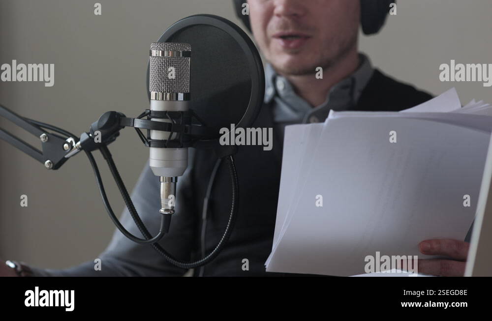 Radio host recording podcast close up, man read text from paper ...