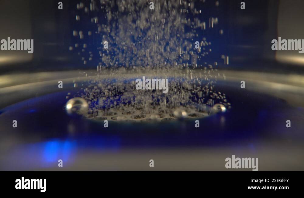 Gas bubbles rise in the bottle for ionization, structuring and ...