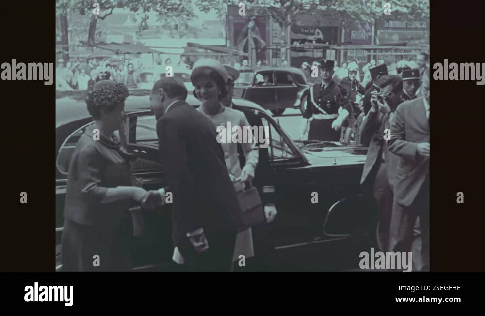1960s: Soldiers forcefully push back crowd as President Kennedy and ...